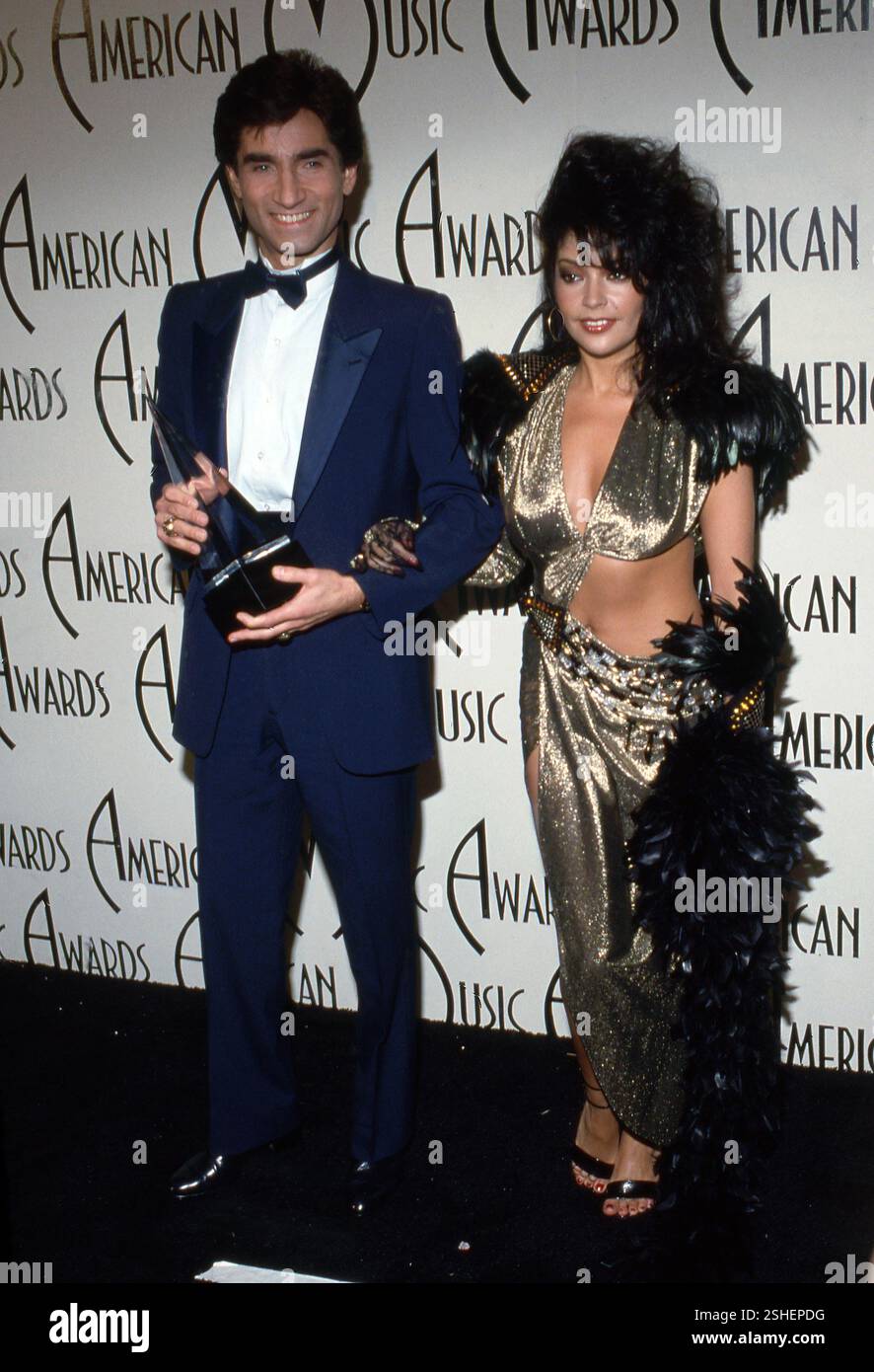 Richard Sterban and Apollonia Kotero at the 12th Annual American Music ...