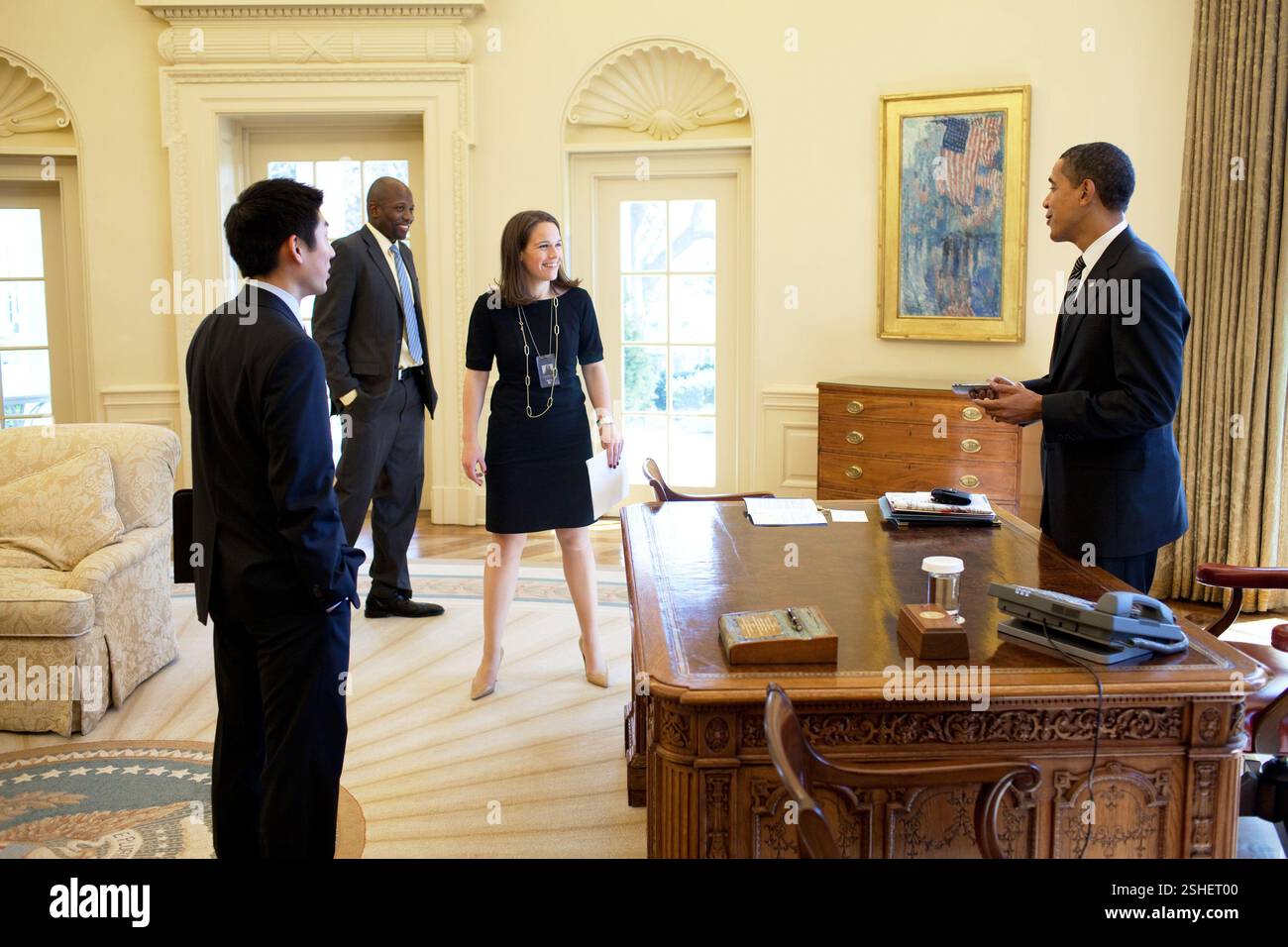 President Barack Obama jokes with Special Assistant Eugene Kang ...