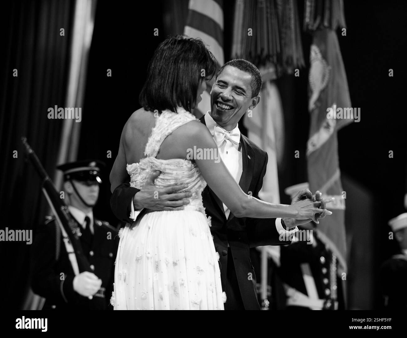 President Barack Obama and First Lady Michelle Obama dance at the Mid ...