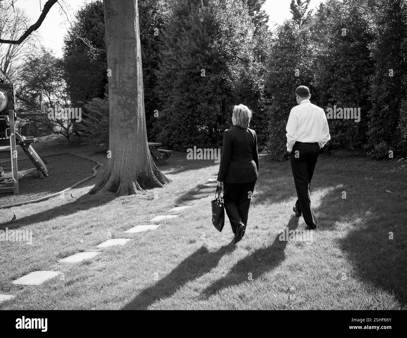 President Barack Obama walks with Secretary of State Hillary Rodham ...