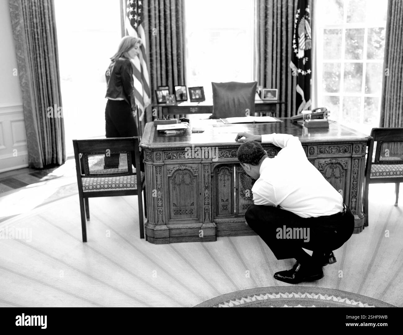 President Barack Obama examines the Resolute Desk on March 3, 2009 ...