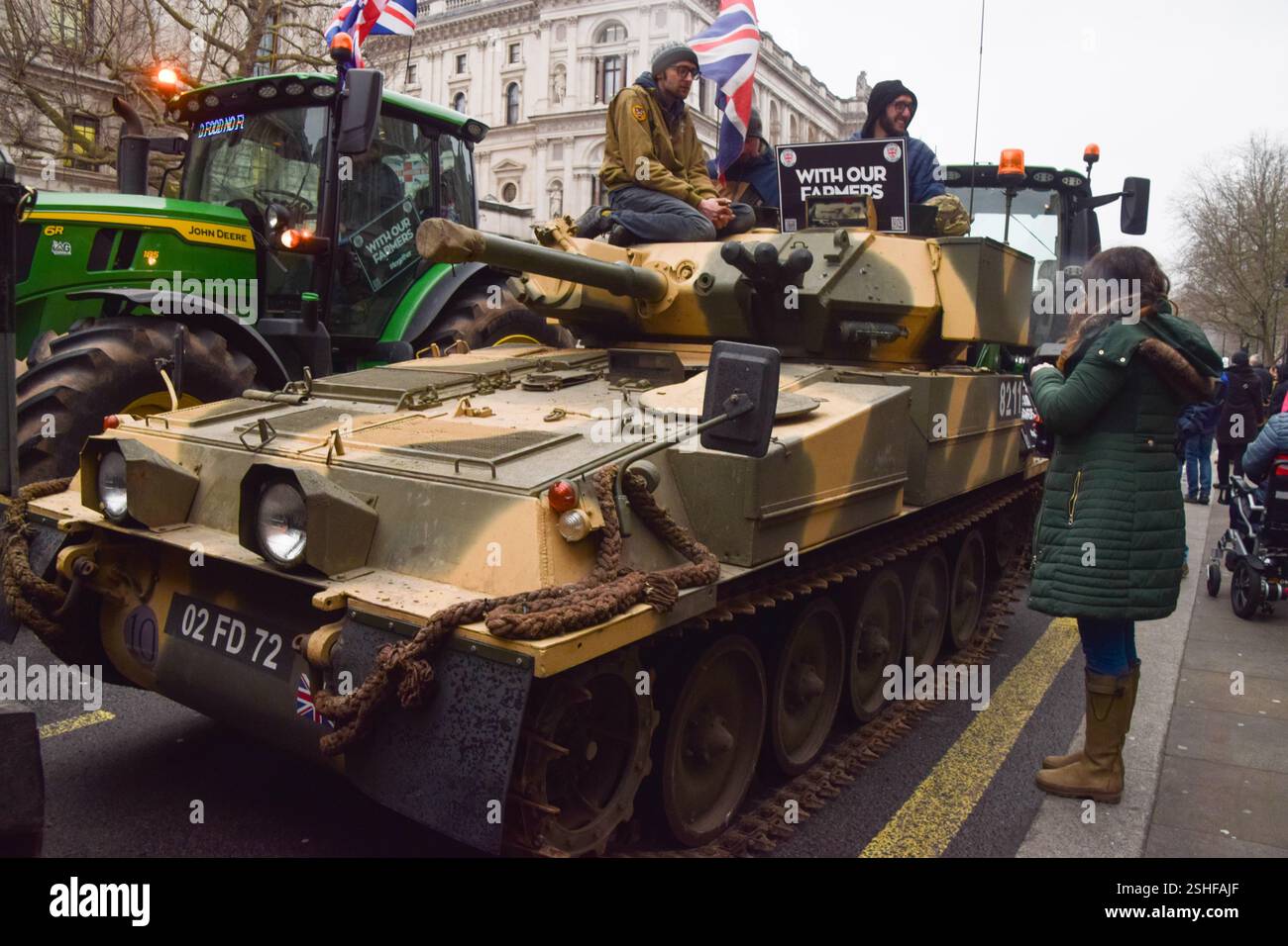 London, UK. 10th Feb, 2025. Protesters sit on a tank in Whitehall ...