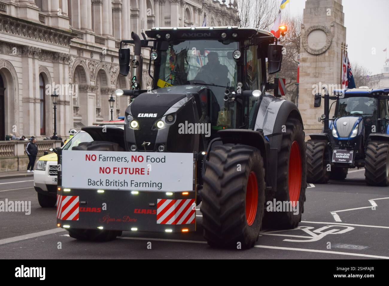 London, UK. 10th Feb, 2025. A tractor with a sign supporting British ...
