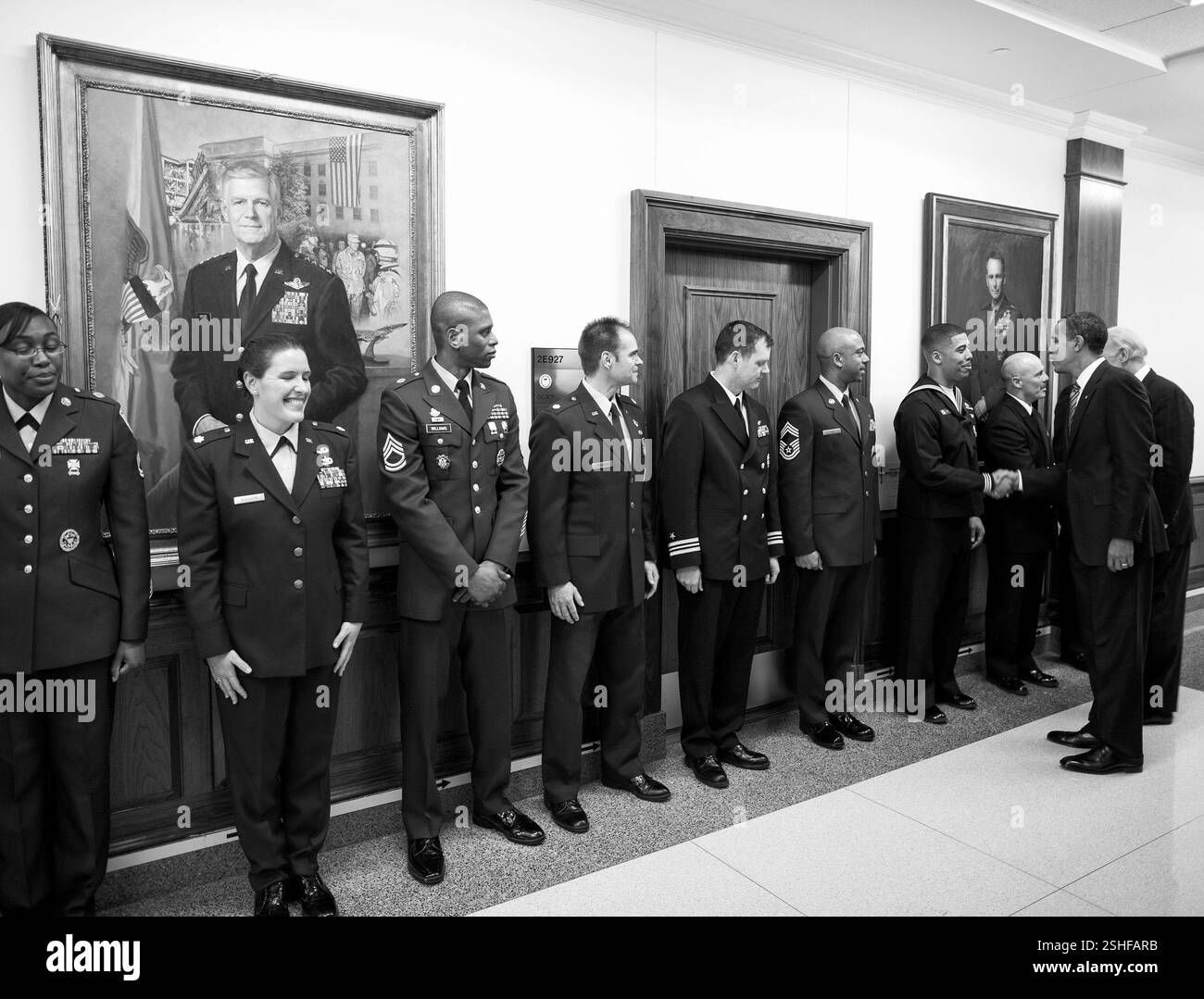 President Barack Obama and VP Joe Biden greet military personnel during ...