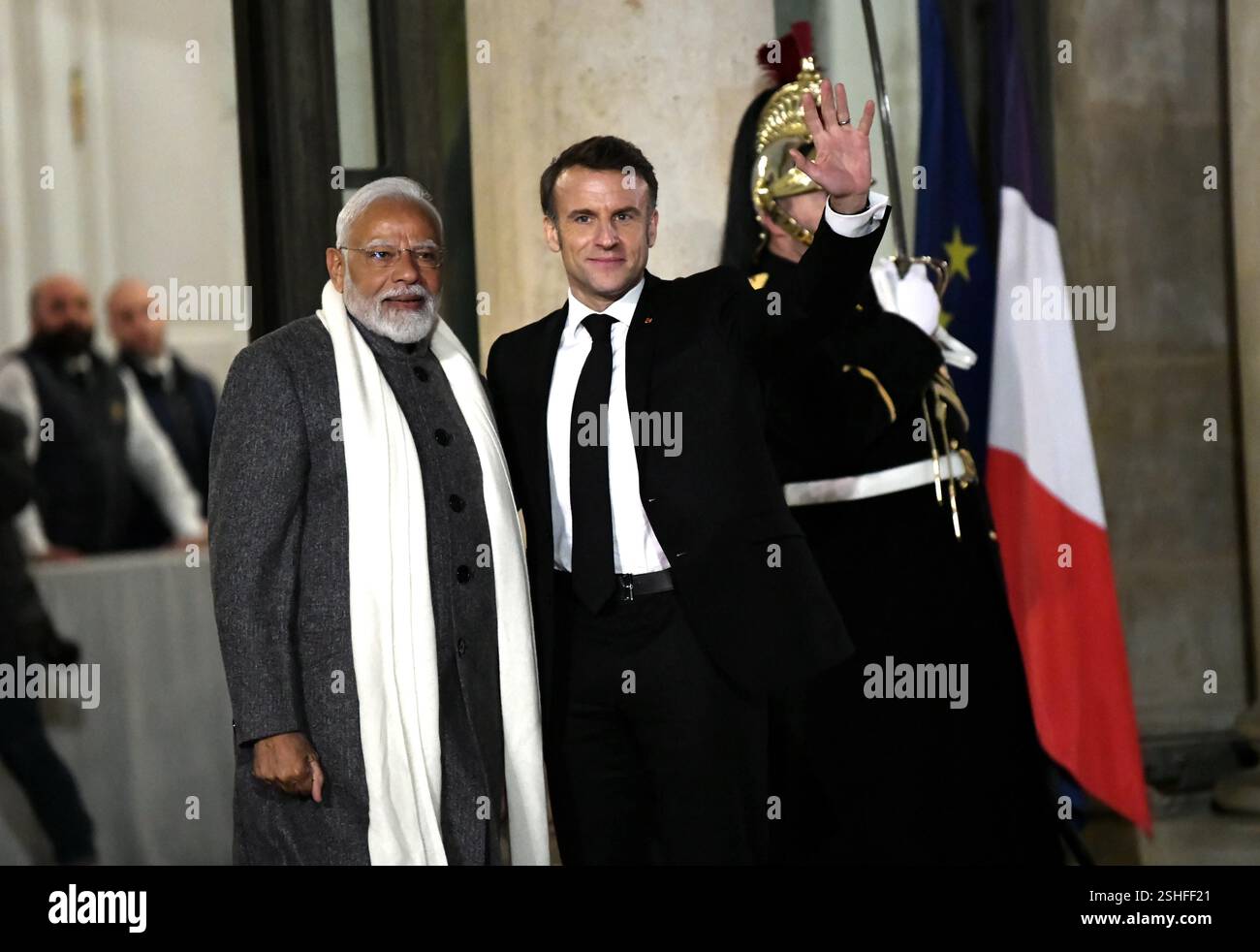 Paris, France.10th February 2025. French President Emmanuel Macron (R ...