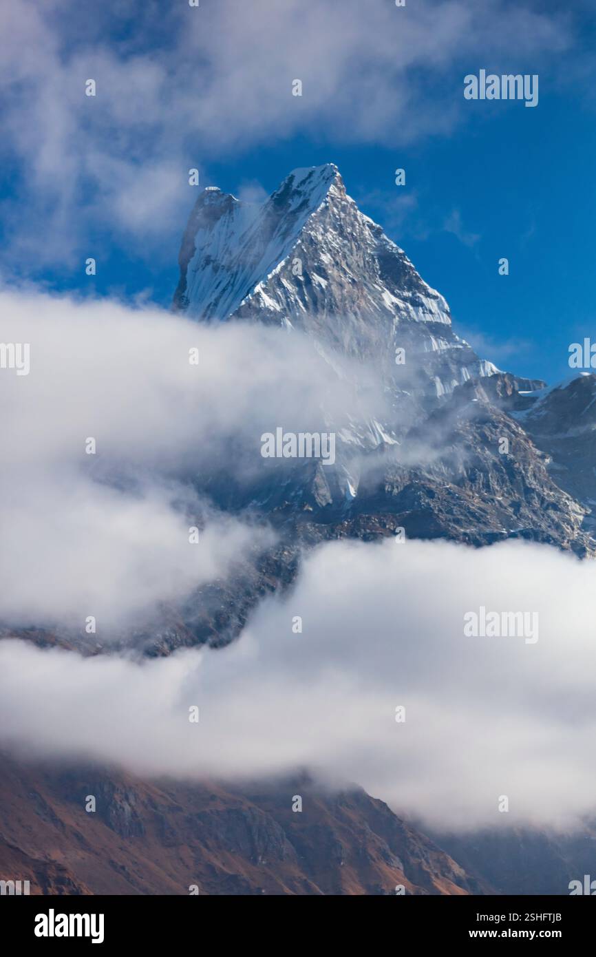 The sacred mountain Machapuchare, also known as the Fish Tail, rises to ...