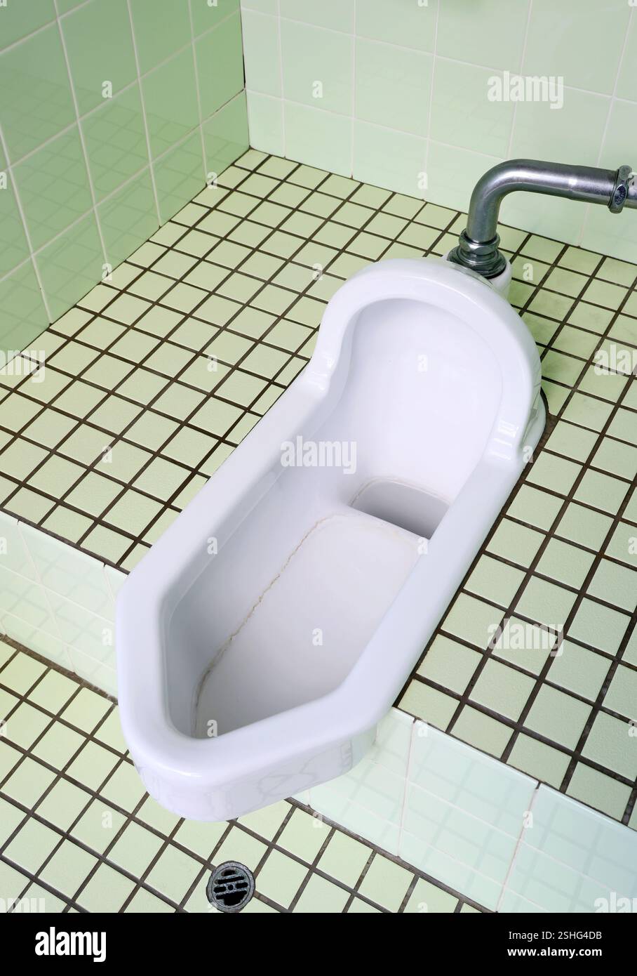 Traditional Japanese old style squat toilet in the house Stock Photo ...