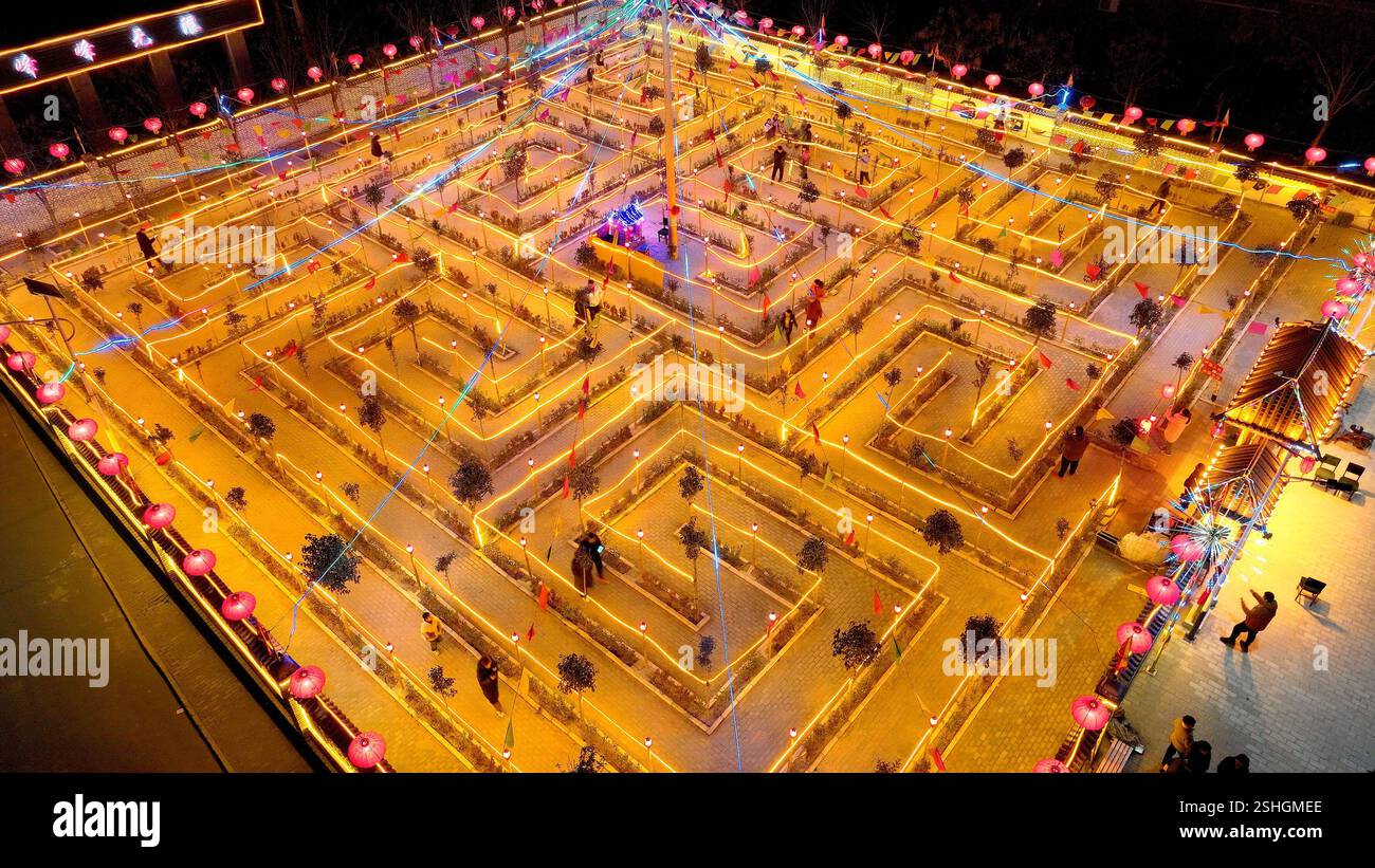 HANDAN, CHINA - FEBRUARY 10, 2025 - Tourists view festive lanterns at ...