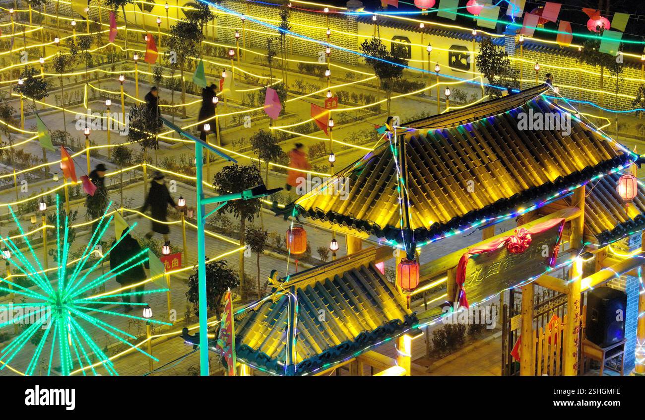 HANDAN, CHINA - FEBRUARY 10, 2025 - Tourists view festive lanterns at ...