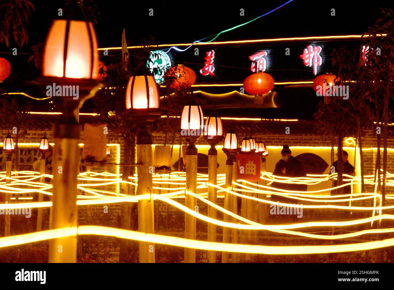 HANDAN, CHINA - FEBRUARY 10, 2025 - Tourists view festive lanterns at ...
