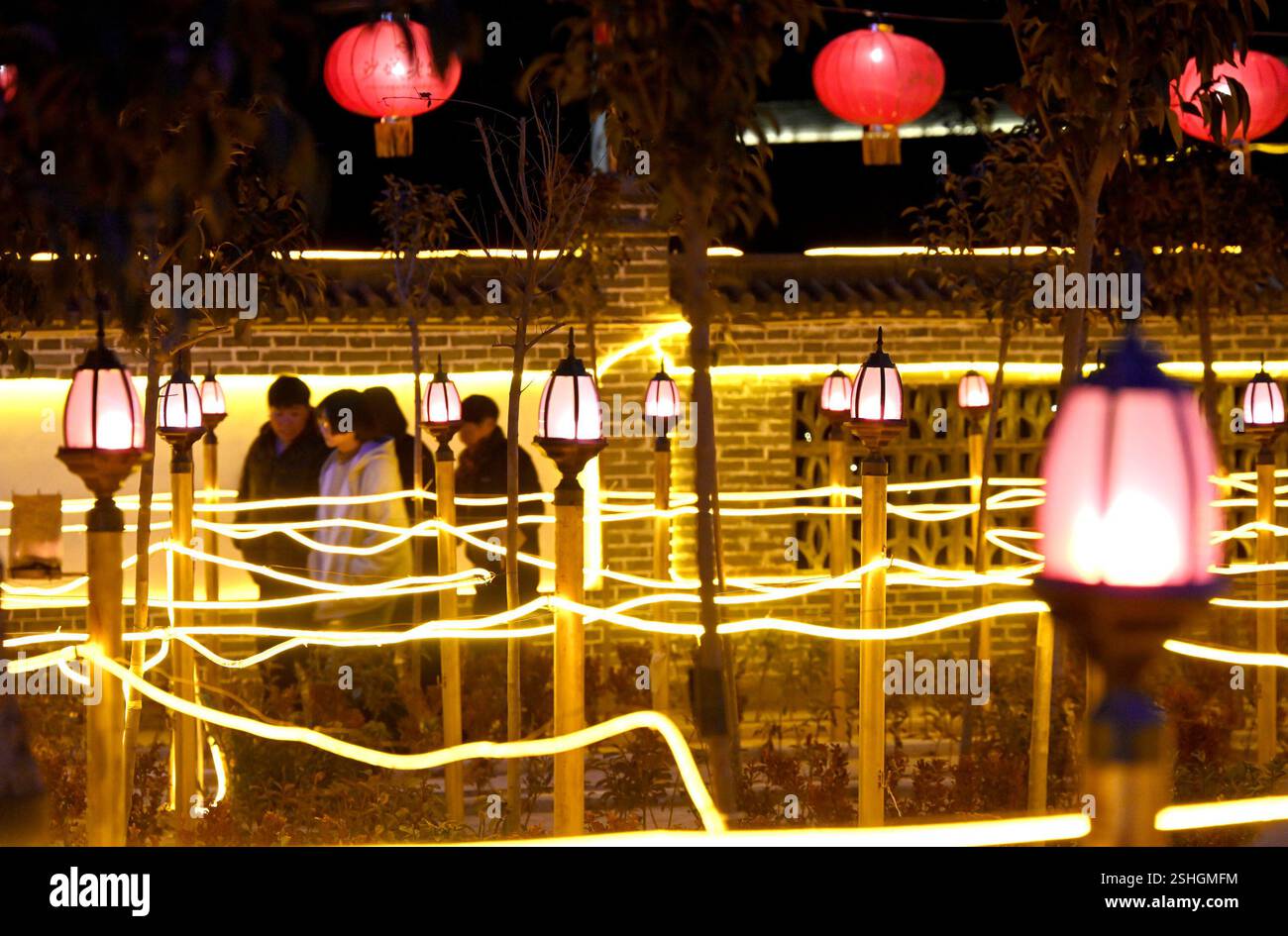 HANDAN, CHINA - FEBRUARY 10, 2025 - Tourists view festive lanterns at ...