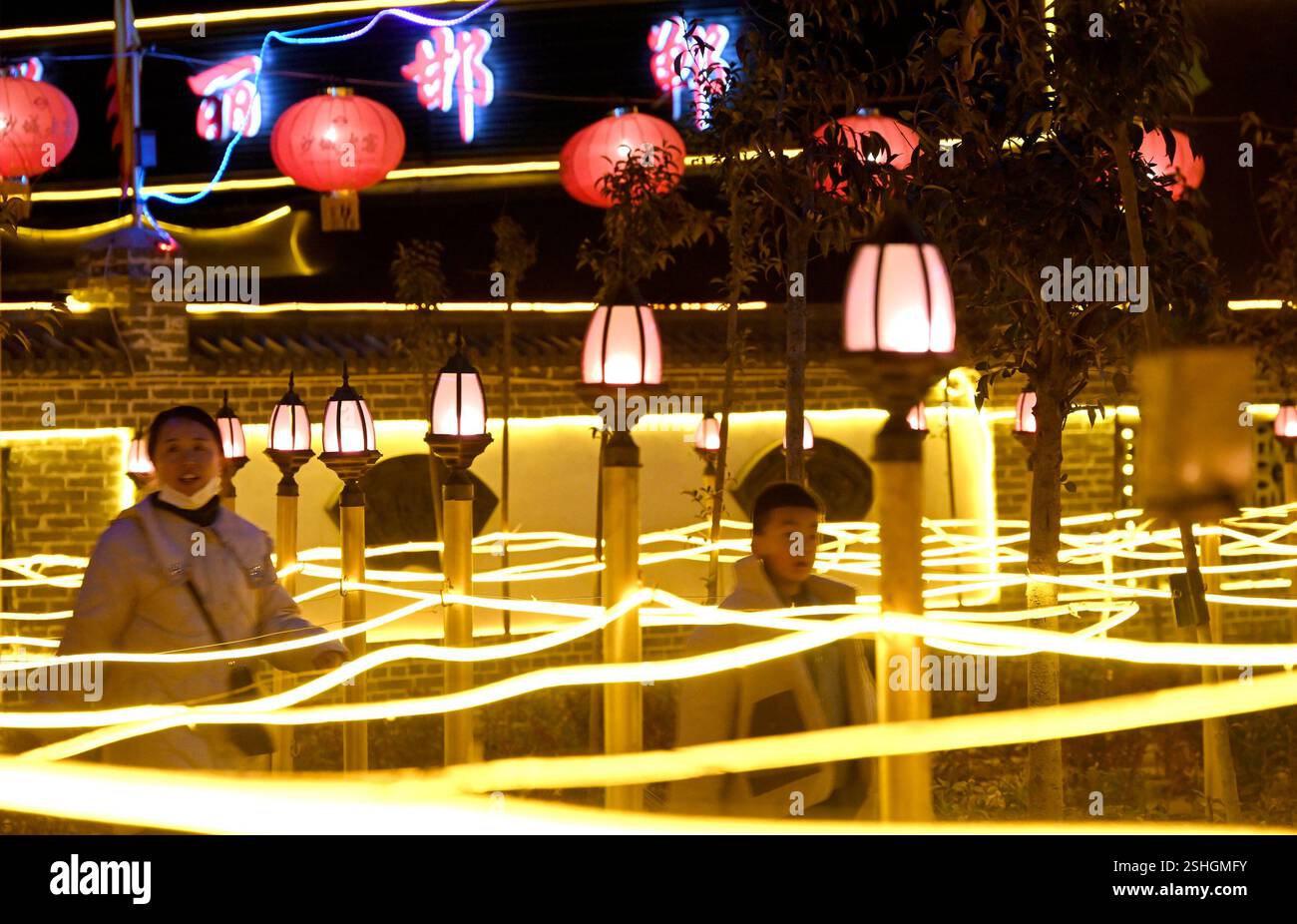 HANDAN, CHINA - FEBRUARY 10, 2025 - Tourists view festive lanterns at ...