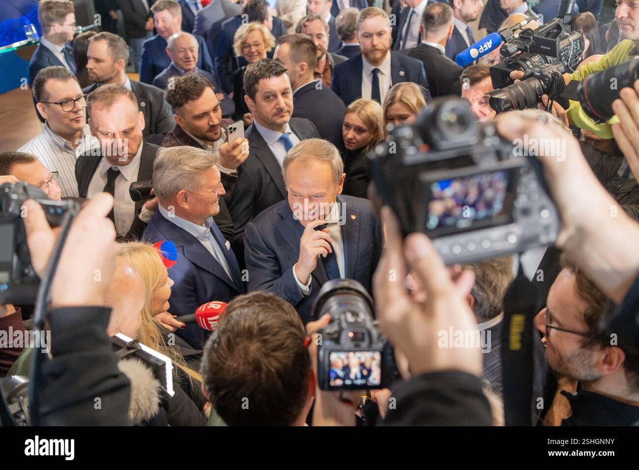 Poland's Prime Minister Donald Tusk talks to the media during an event ...