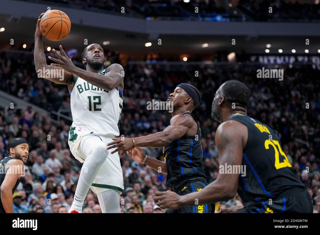 Milwaukee Bucks' Taurean Prince (12) shoots looks to shoot against ...