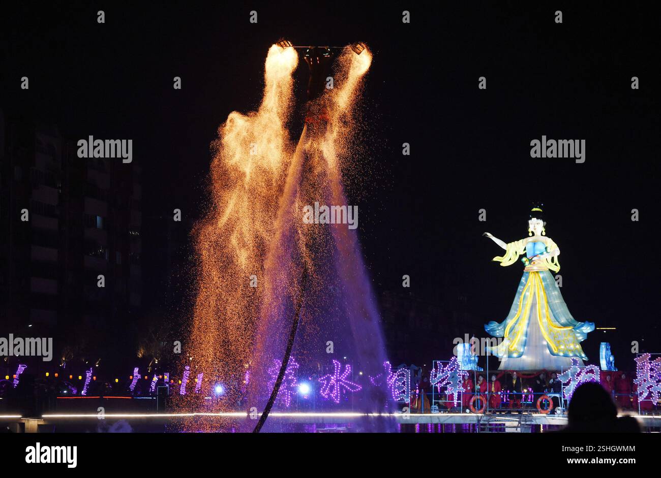 HANDAN, CHINA - FEBRUARY 10, 2025 - A water flying man performs a fire ...