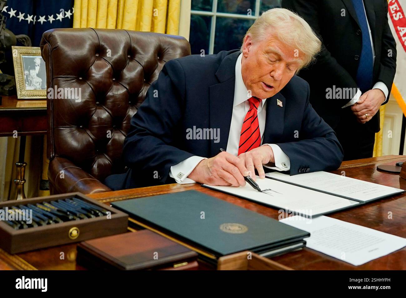 Washington DC, USA. 10th Feb, 2025. US President Donald Trump signs an ...