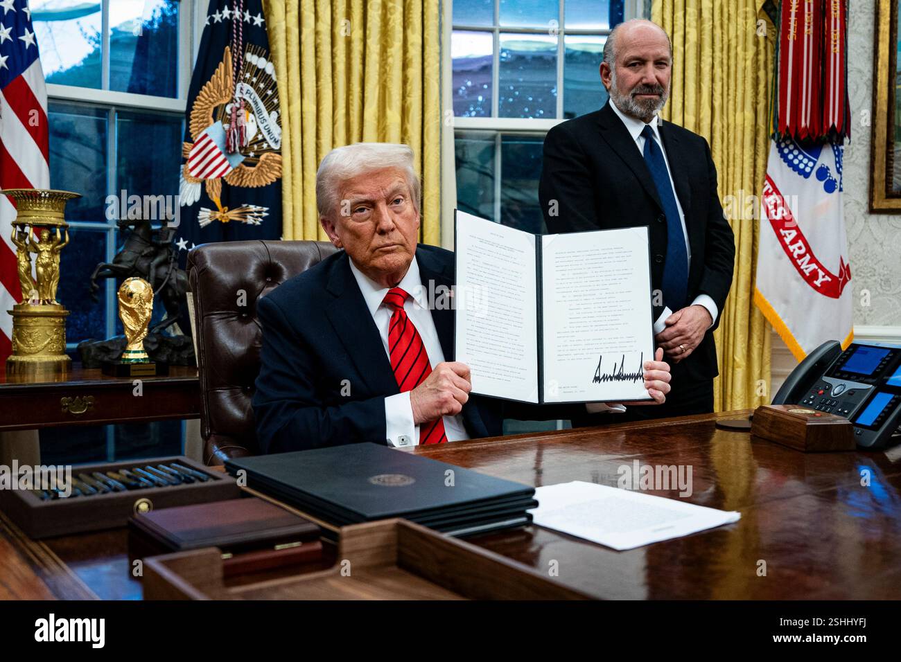 Washington DC, USA. 10th Feb, 2025. US President Donald Trump displays ...