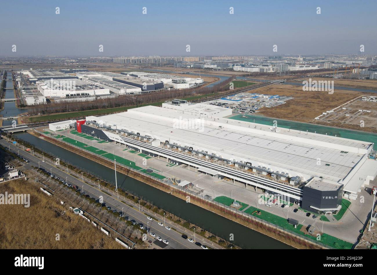 Shanghai, China. 8th Feb, 2025. An aerial drone photo shows U.S ...