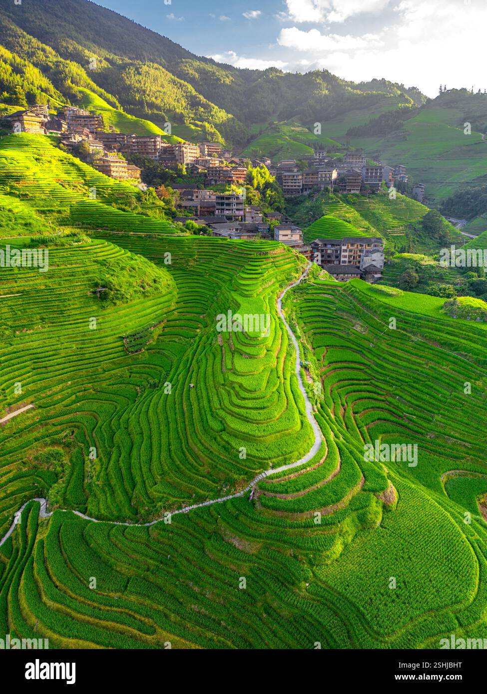 The Longji Rice Terraces in Longsheng China, Drone view of Ping An village Stock Photo - Alamy