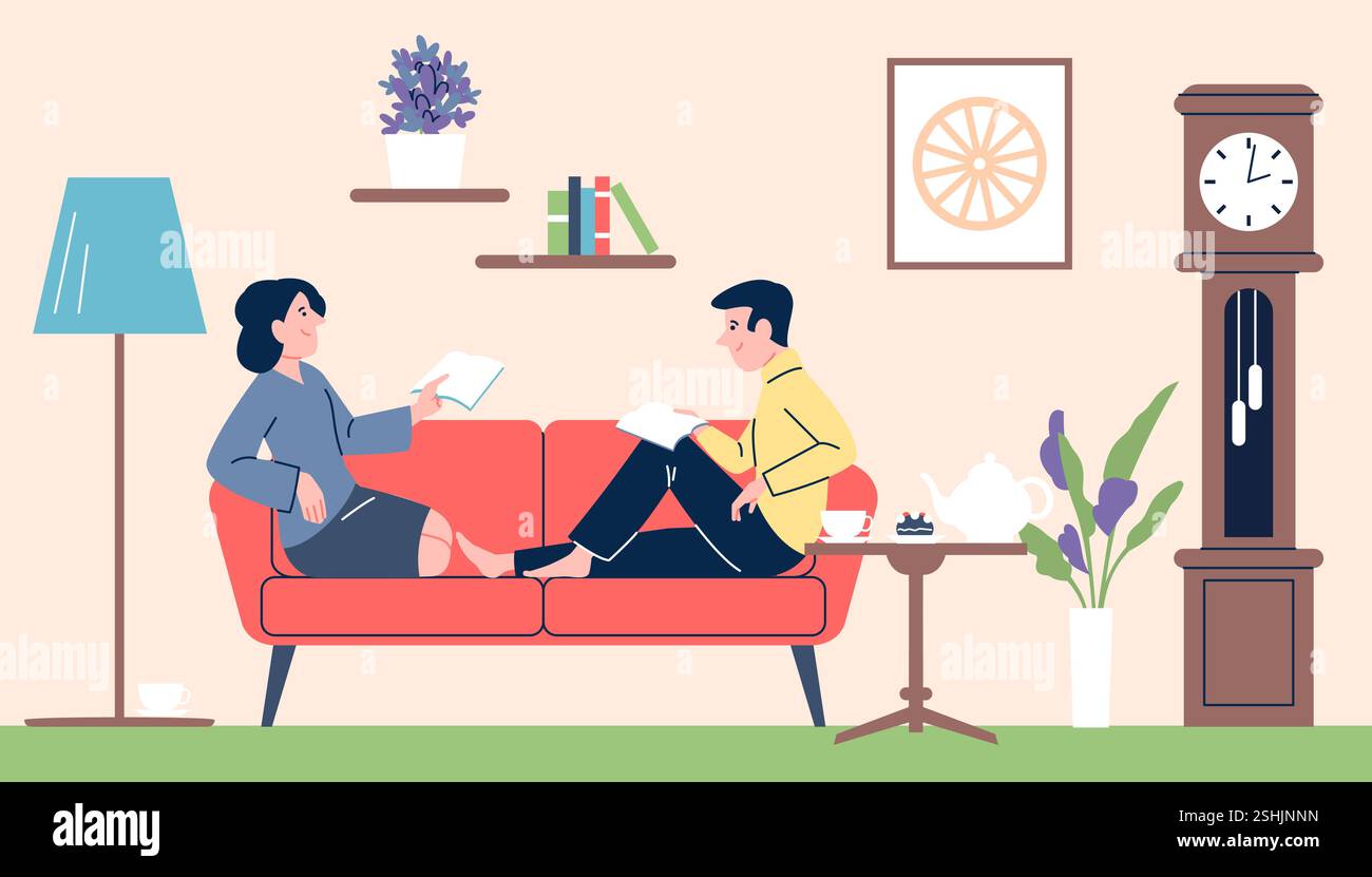 Couple reading on sofa. Young man and woman rest in living room with ...