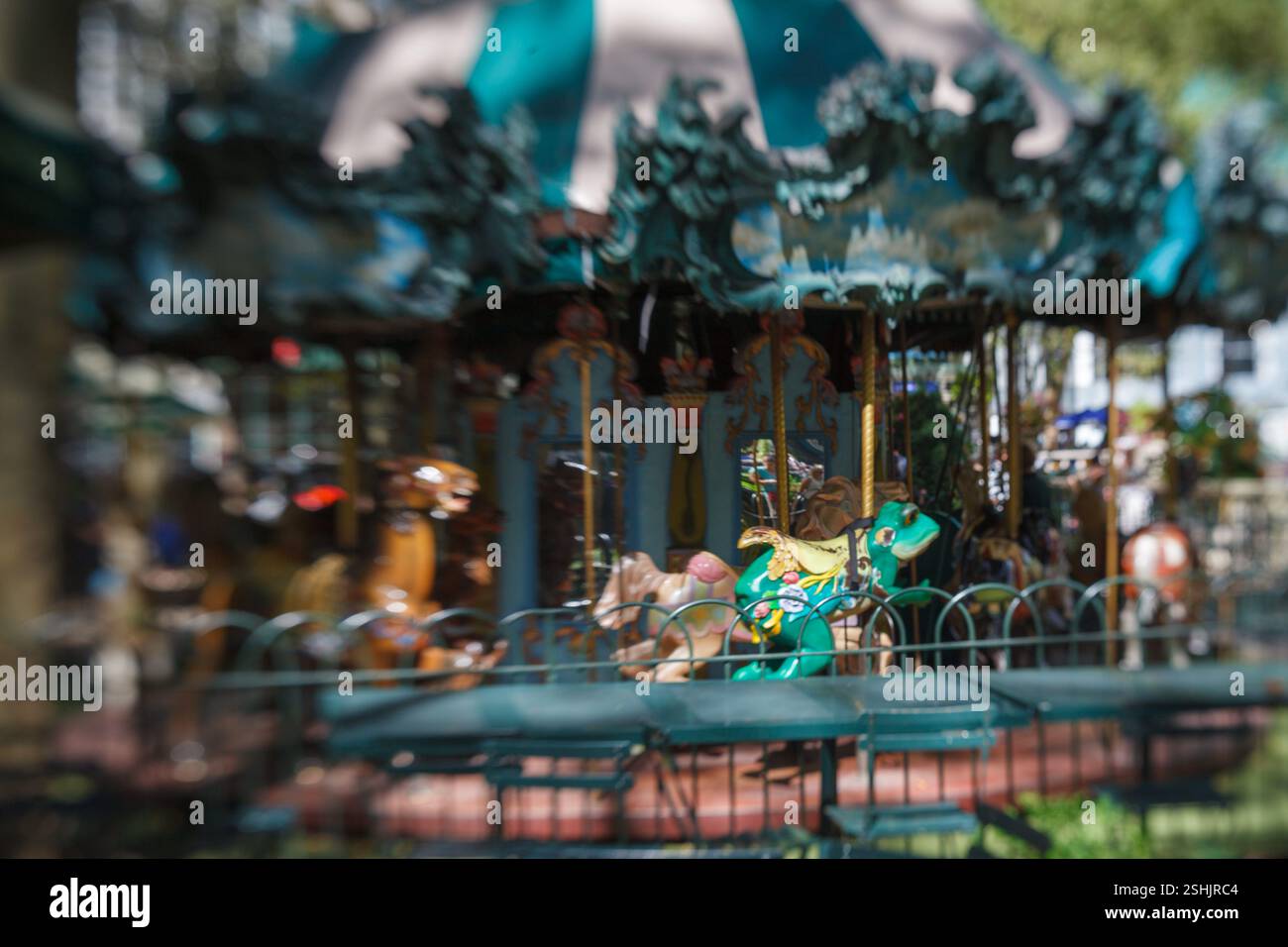 The Bryant park iconic carousel with horses and frogs, Midtown ...