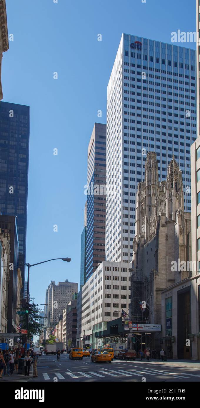 The skyscrapers and the dornate gothic tower of St Thomas church in ...