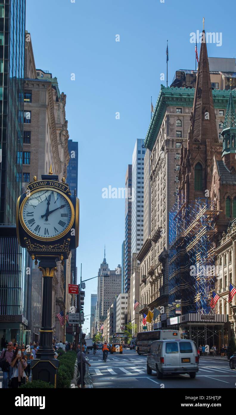 The Trump Tower clock and the Presbyterian church tower in Fifth Avenue, Midtown Manhattan, New ...