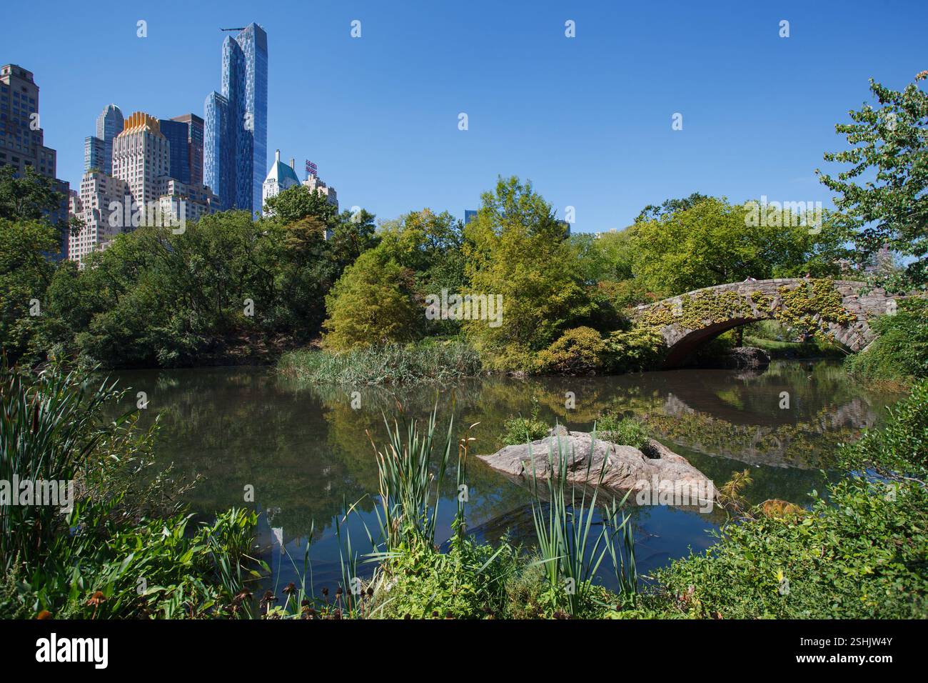 The Pond lake in Central Park, One57, Trump parc and the skyscrapers of ...
