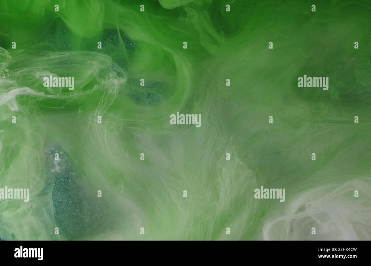 Cloud smoke. Ink water. Defocused green white color glowing splashes ...