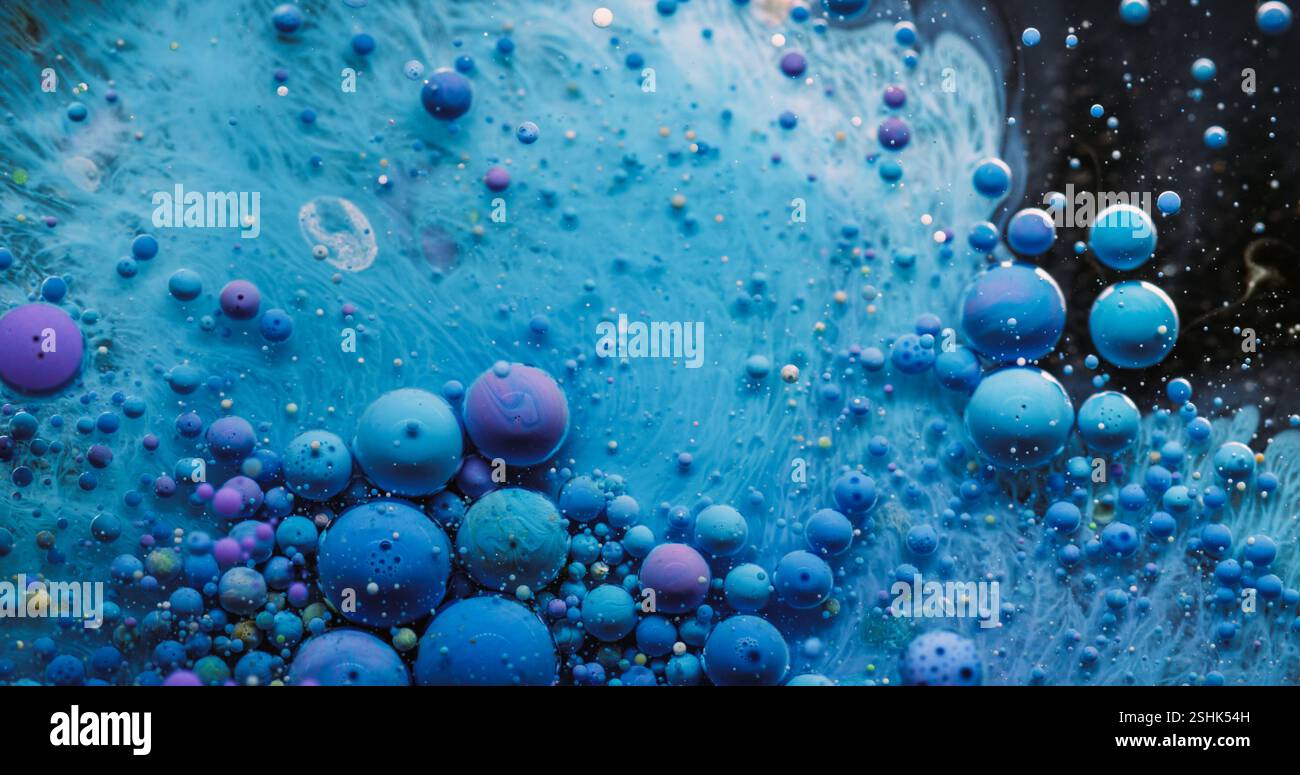 Ink pouring water pigment blend hi-res stock photography and images - Alamy