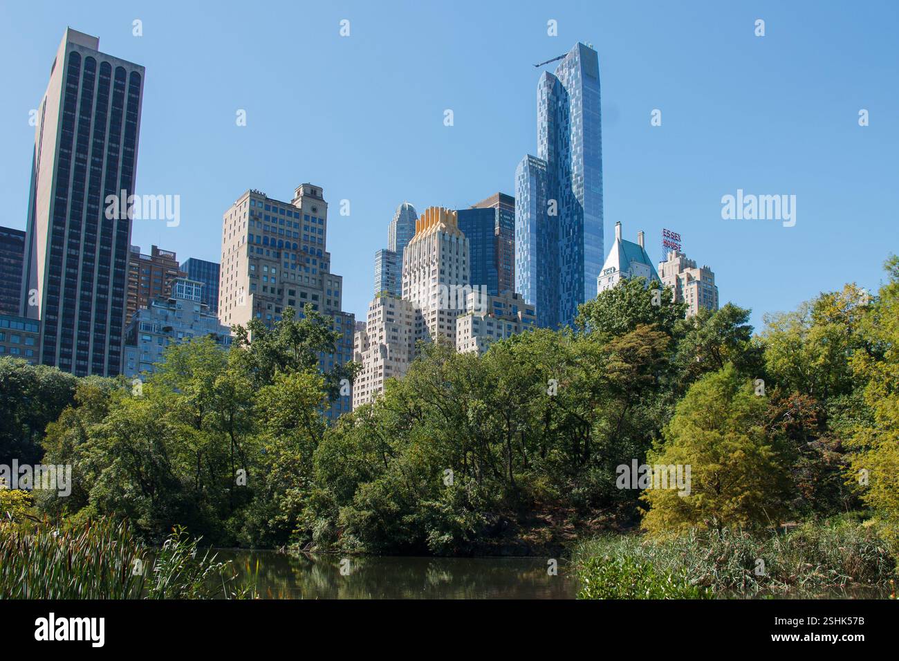 The Pond lake in Central Park, One57, Trump parc and the skyscrapers of ...