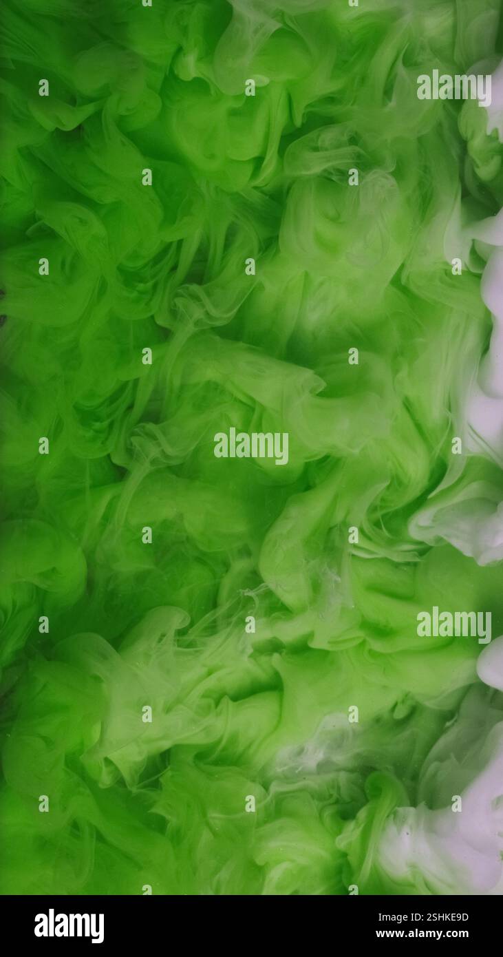 Wave paint art. Water ink surface. Defocused green white color haze ...