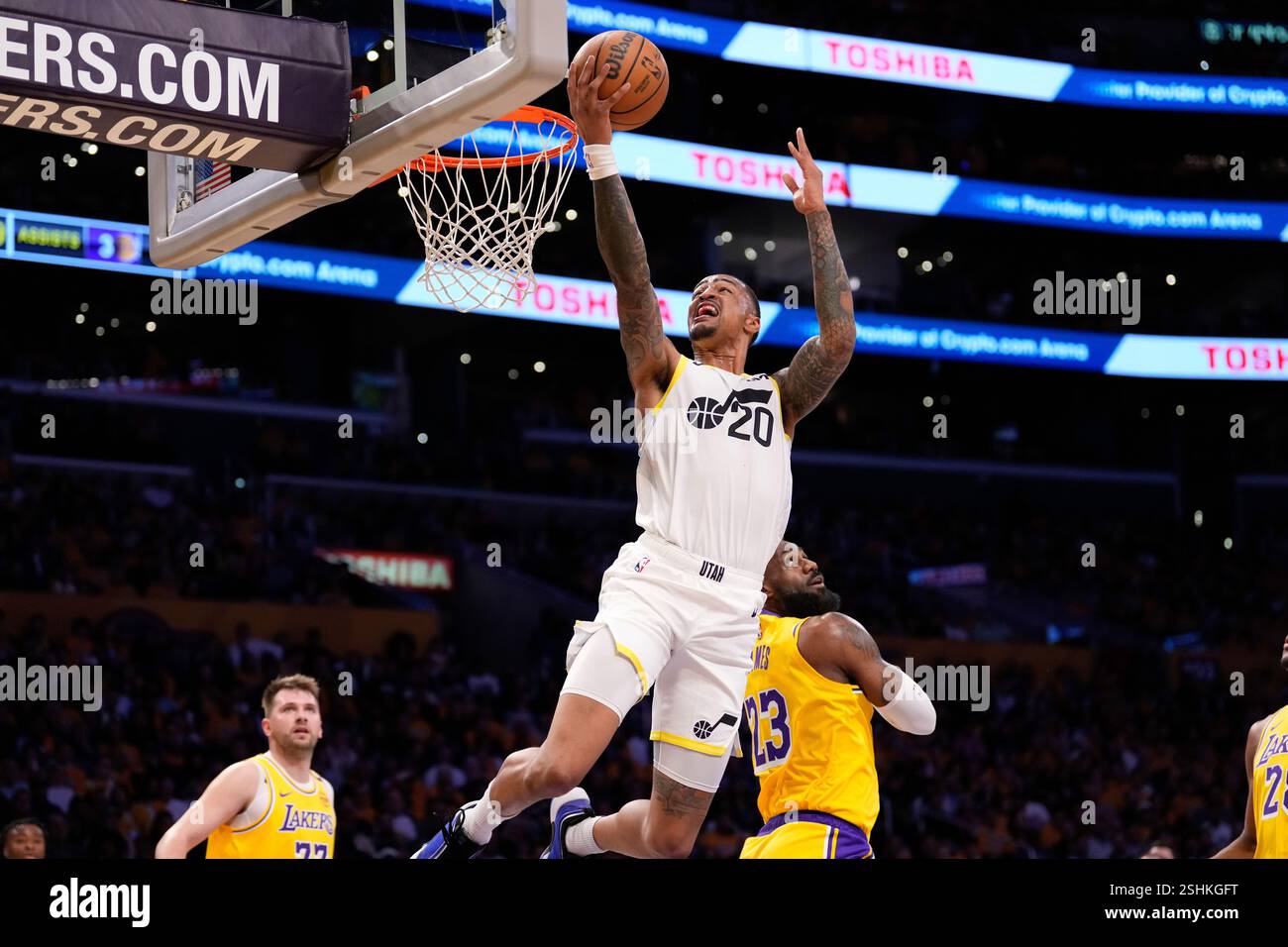 Utah Jazz forward John Collins, above, shoots past Los Angeles Lakers ...