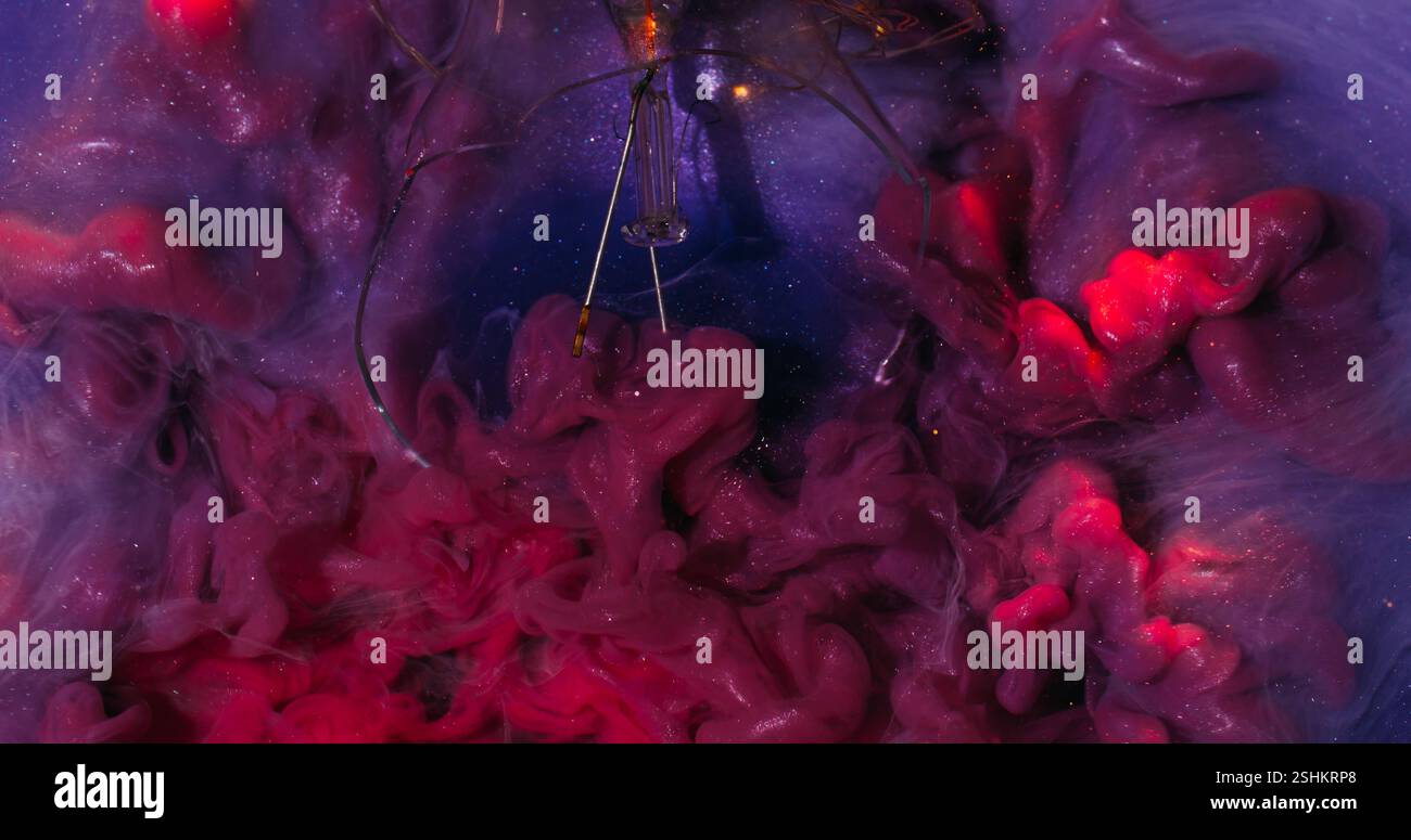 Particles paint. Smoky flow. Shimmering hypnotic pink purple current ...