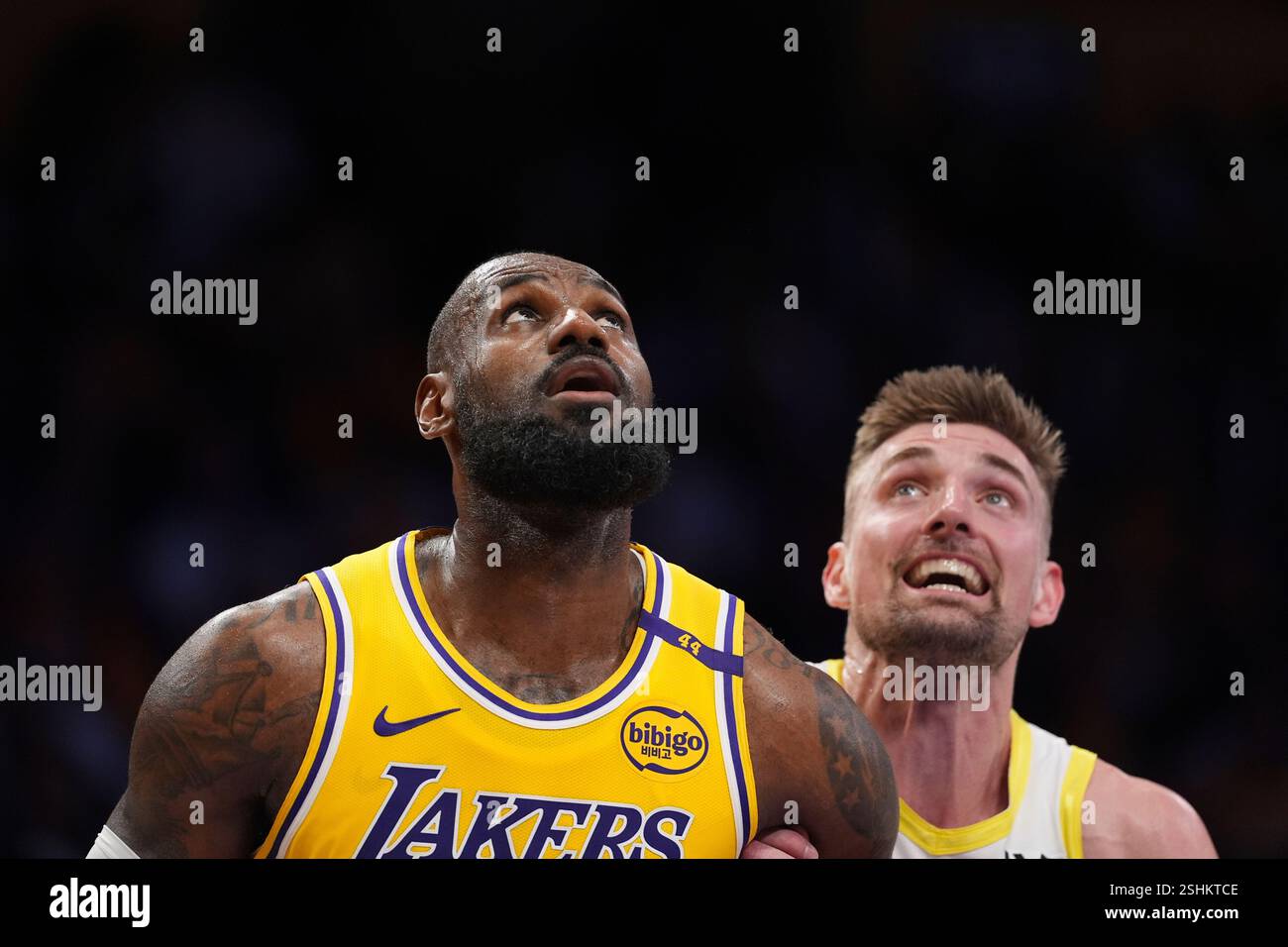 Los Angeles Lakers forward LeBron James, left, battles Utah Jazz center ...