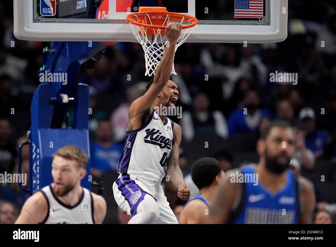 Sacramento Kings guard Malik Monk (0) celebrates after dunking in the ...