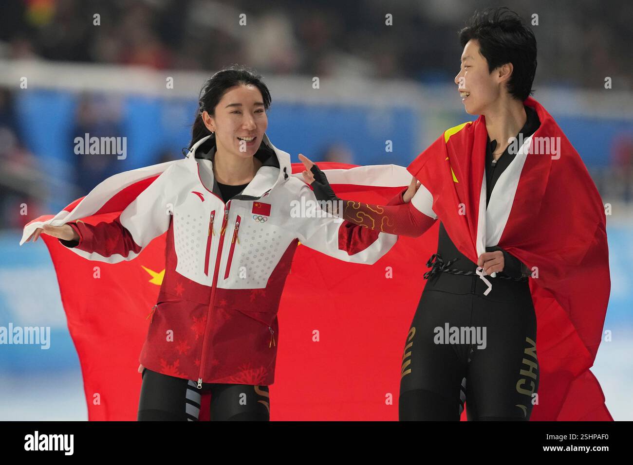 Gold medalist China's Han Mei, left, celebrate with silver medalist Yin ...