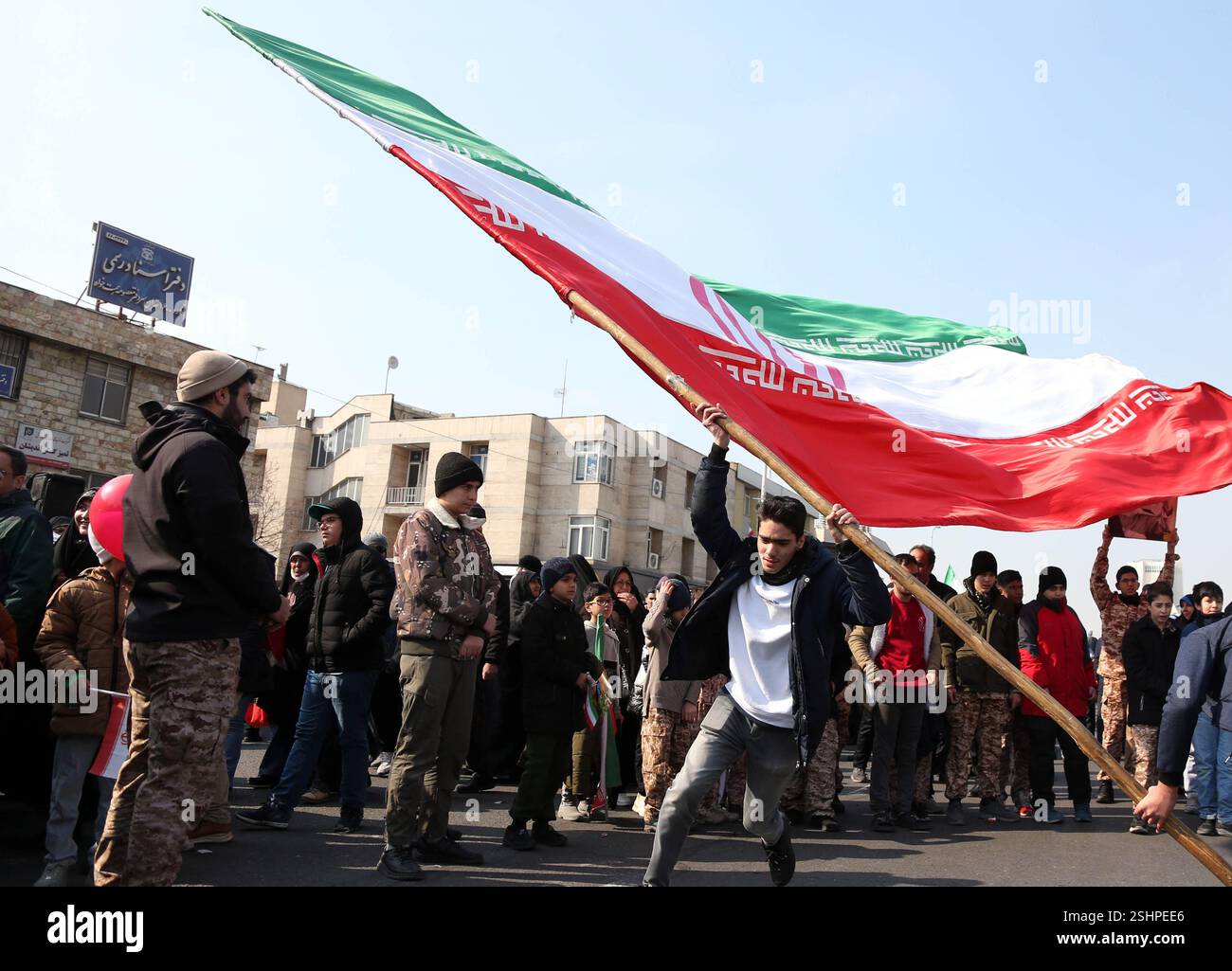 Beijing, Iran. 10th Feb, 2025. People participate in a rally to ...