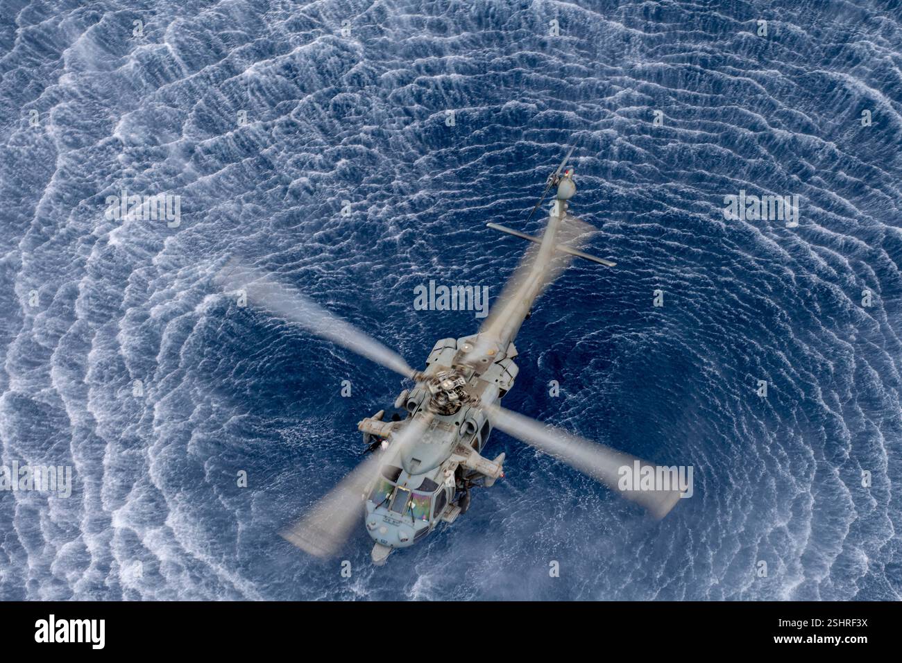 250207-N-GC571-1181 CELEBES SEA (Feb. 7, 2025) An MH-60S Seahawk ...