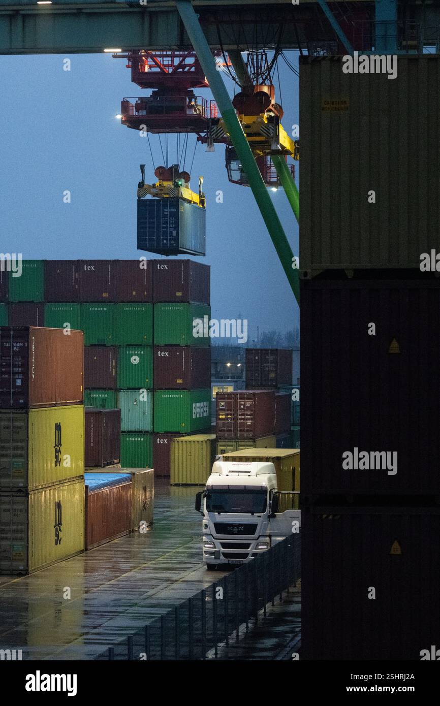 Stuttgart, Germany. 11th Feb, 2025. Containers are reloaded at the port ...