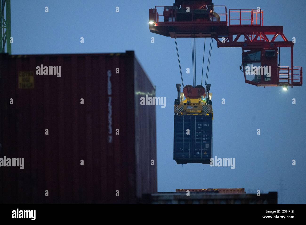 Stuttgart, Germany. 11th Feb, 2025. Containers are reloaded at the port ...