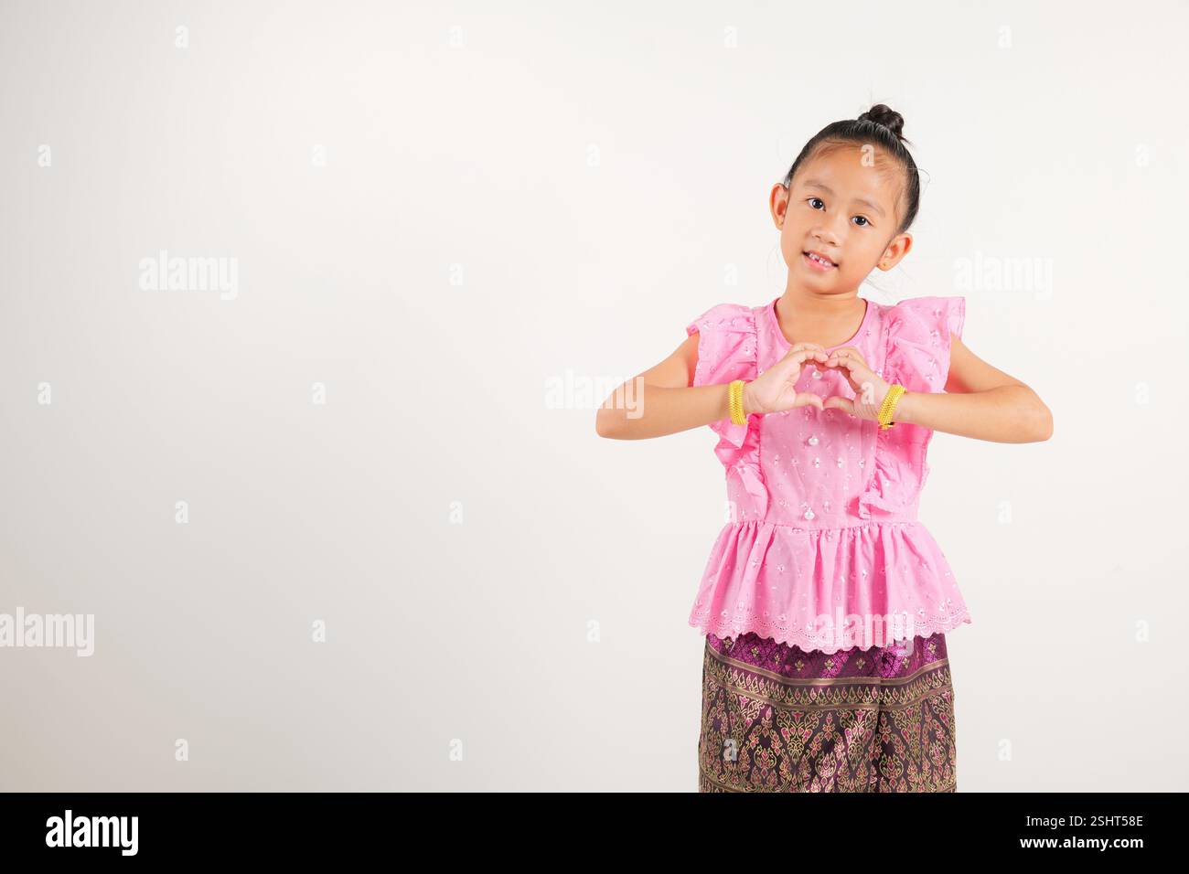 Portrait Thailand kid girl smiling traditional Thai dress costume shows ...