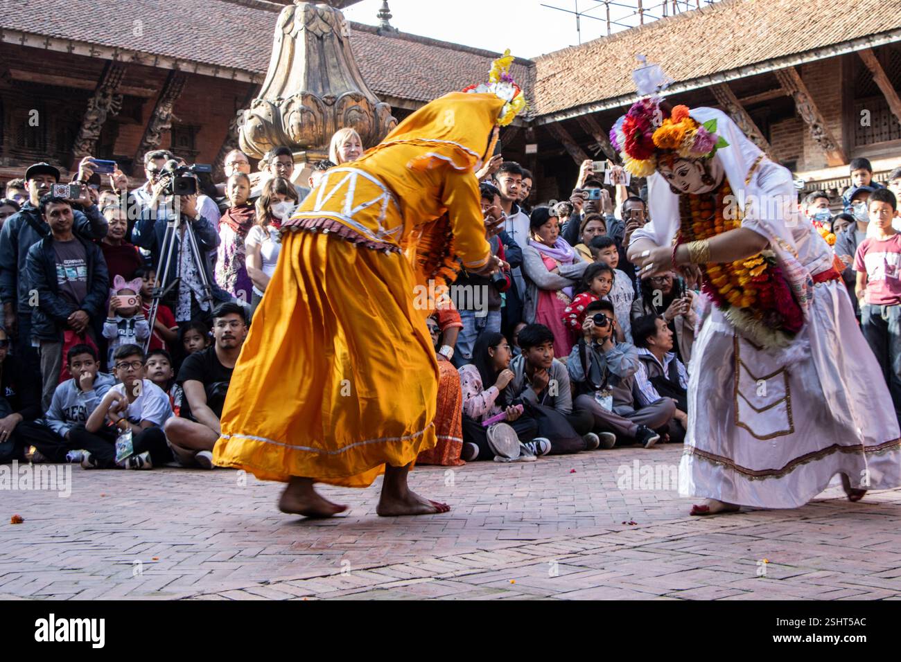 Newar boys of Bajracharya or Shakya caste don clothes, ornaments, and ...