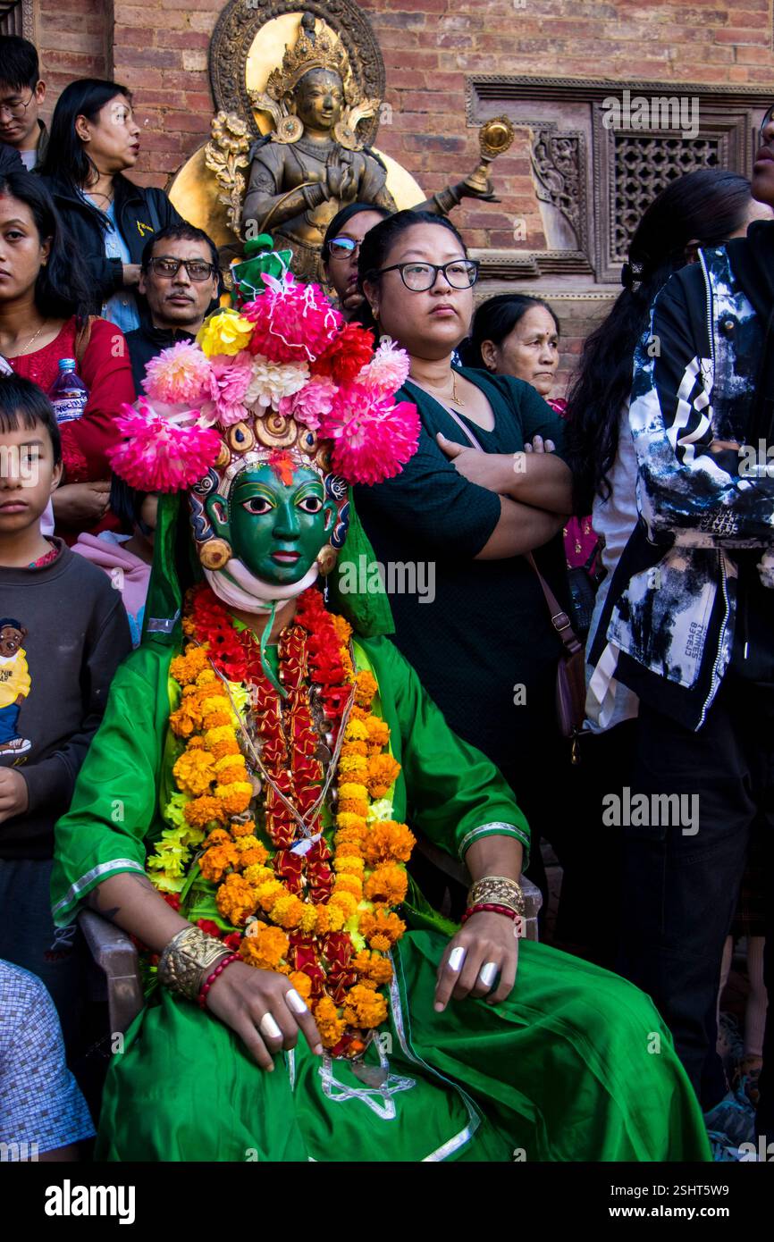 Narayani, one of the Ashtamatrika Dancers wears a green mask and attire ...