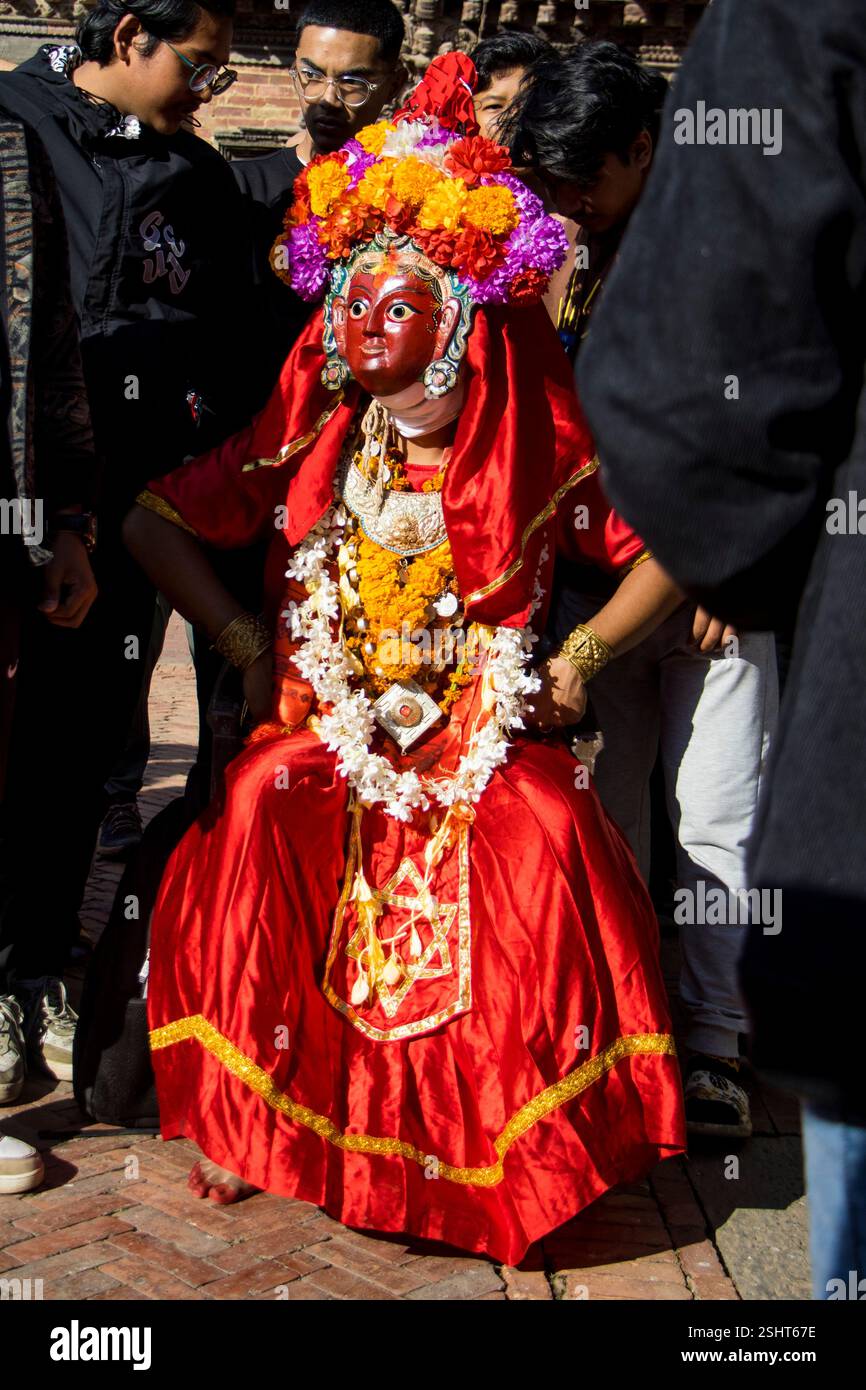 Kaumari, one of the Ashtamatrika Dancers wears a red mask and attire ...