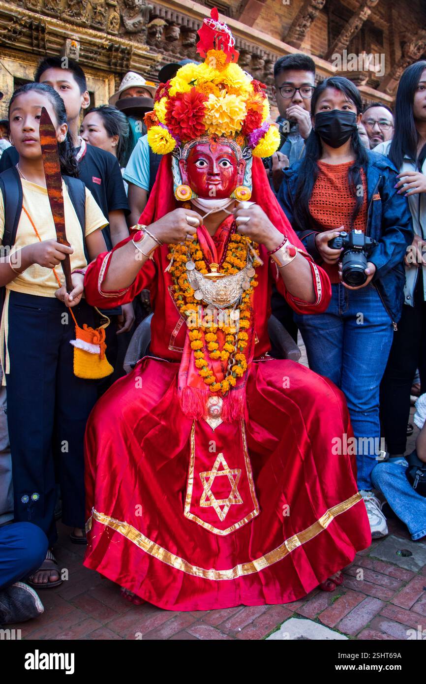 Kaumari, one of the Ashtamatrika Dancers wears a red mask and attire ...