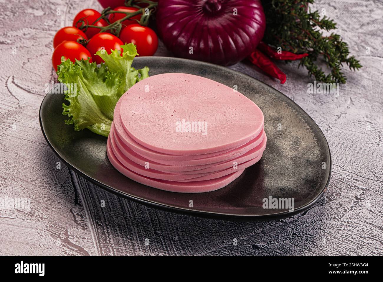 Boiled pork sliced sausage stack for breakfast Stock Photo - Alamy