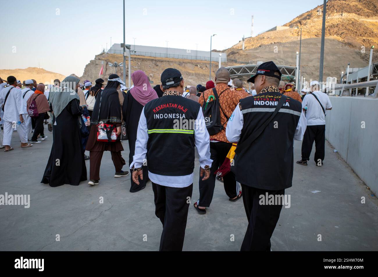 Mecca, Saudi Arabia - June 18, 2024: Petugas Haji Indonesia, Indonesian Hajj Officers walking ...