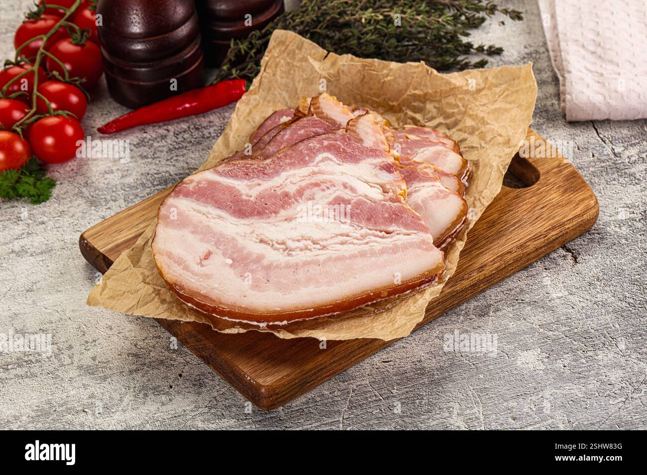 Smoked pork belly slices fat snack Stock Photo - Alamy
