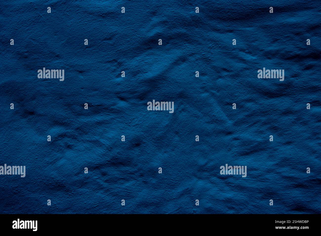 Blue colored abstract wall background with textures of different shades ...